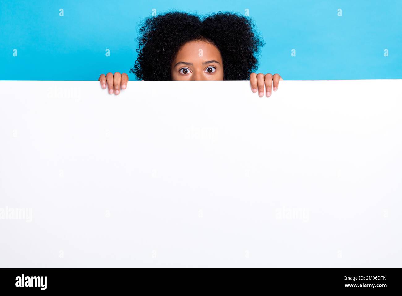 Portrait photo of excited afraid shocked schoolgirl kid hide big ...