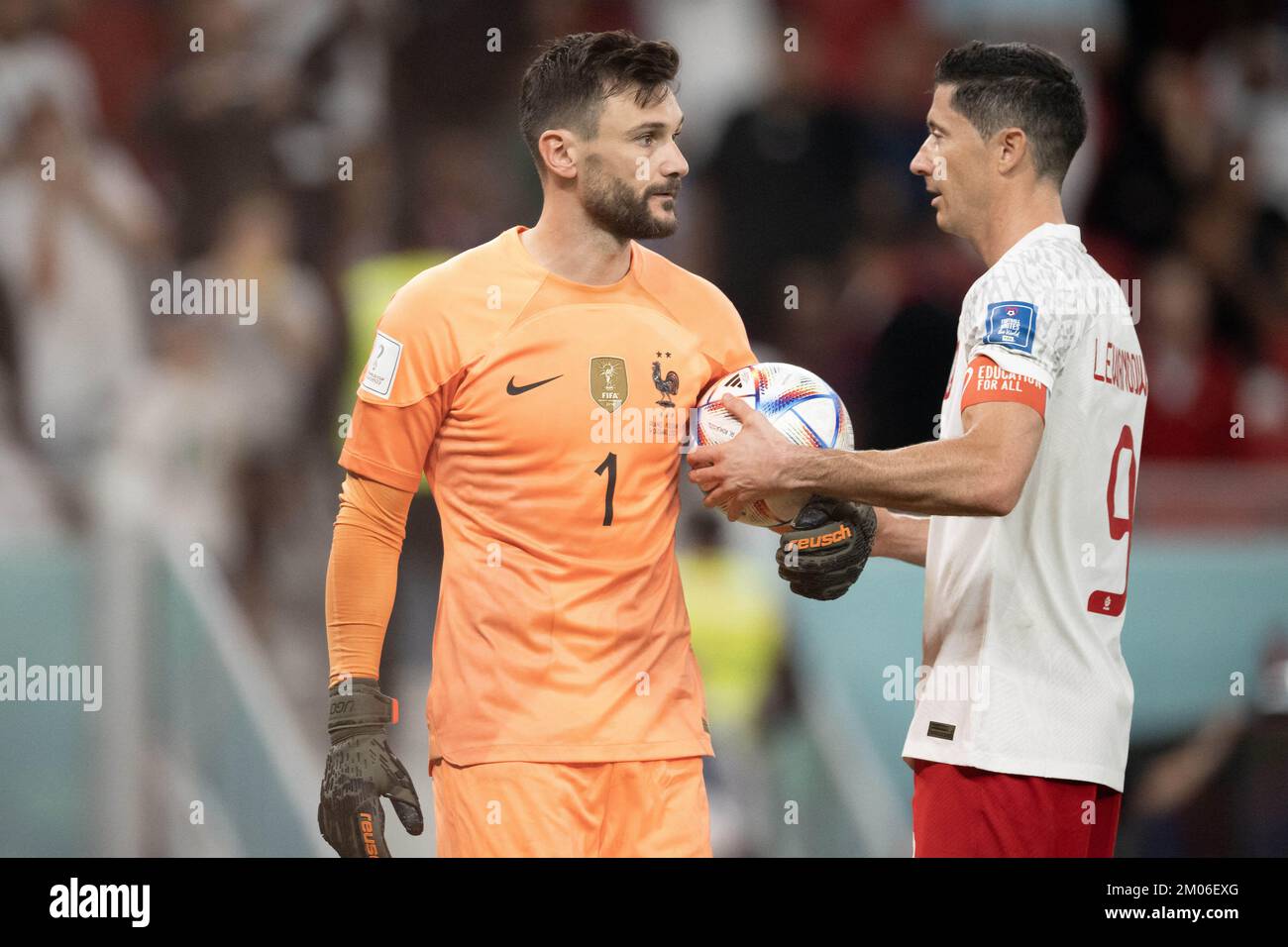 Hugo Lloris of France and Robert Lewandowski of Poland in action during ...