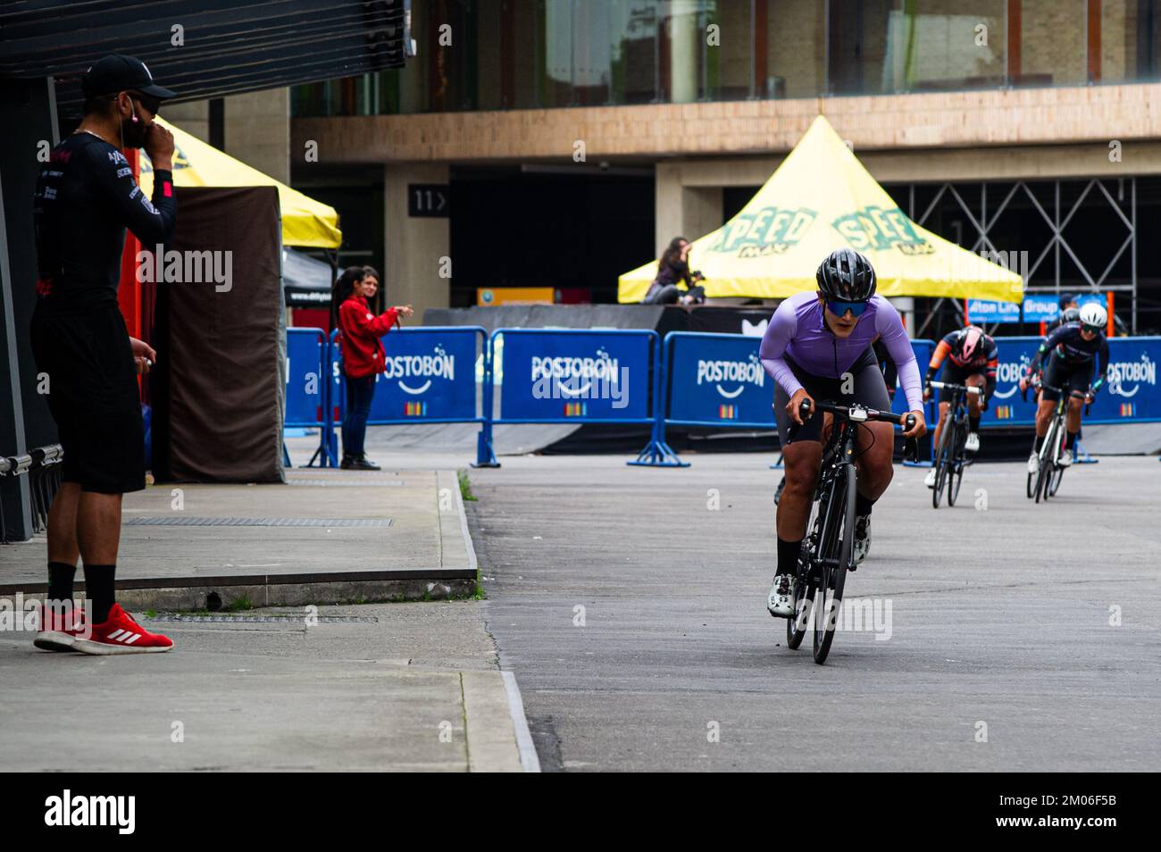 Cyclists from Bogota, participate on the criterium race organized by ...