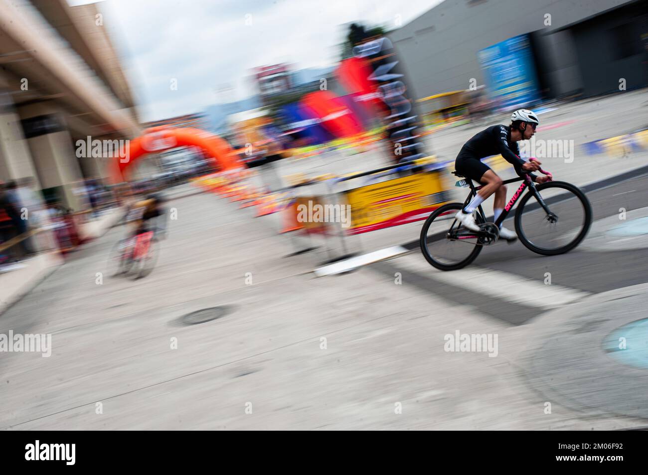 Cyclists from Bogota, participate on the criterium race organized by ...