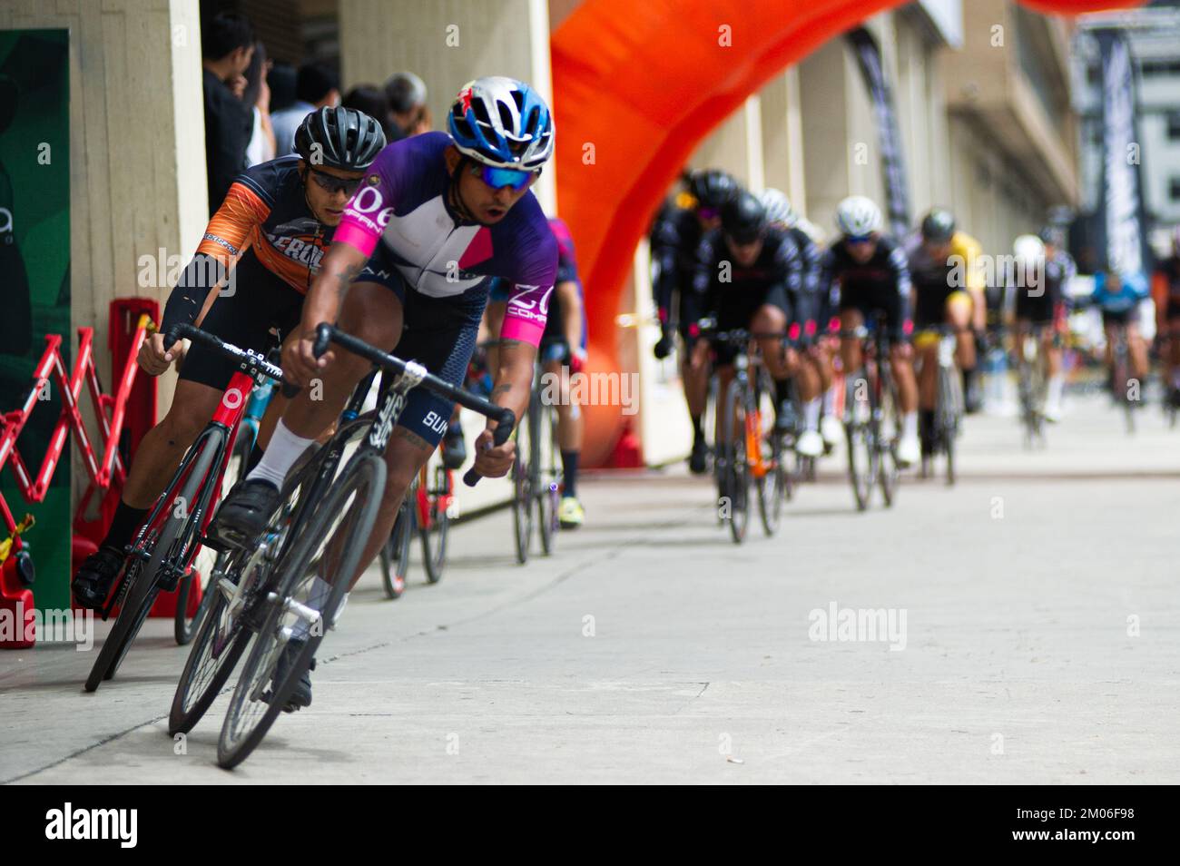 Cyclists from Bogota, participate on the criterium race organized by ...