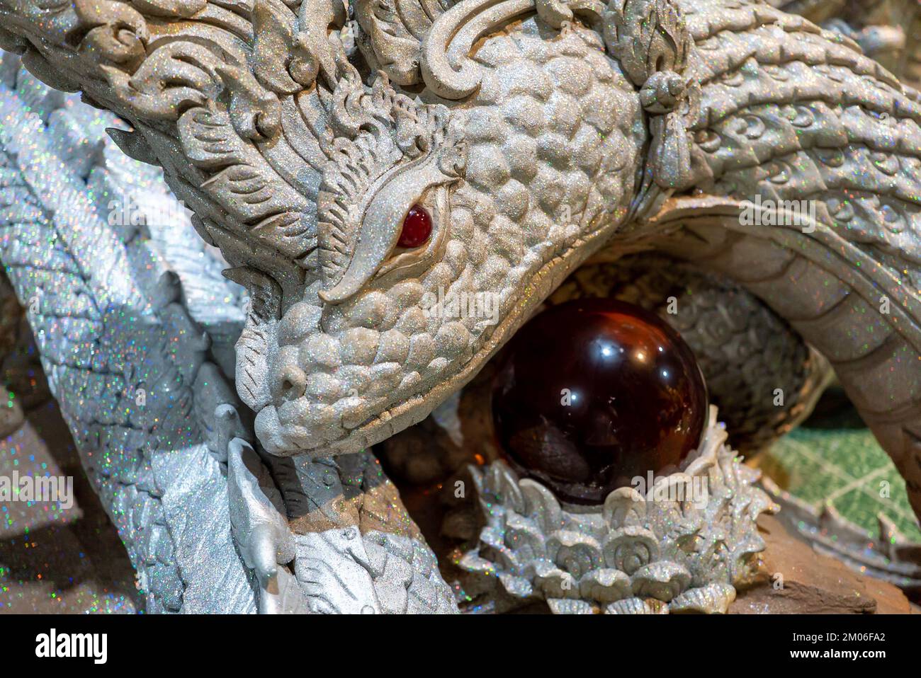 A cave full of mythical animal art called Naga Stock Photo - Alamy