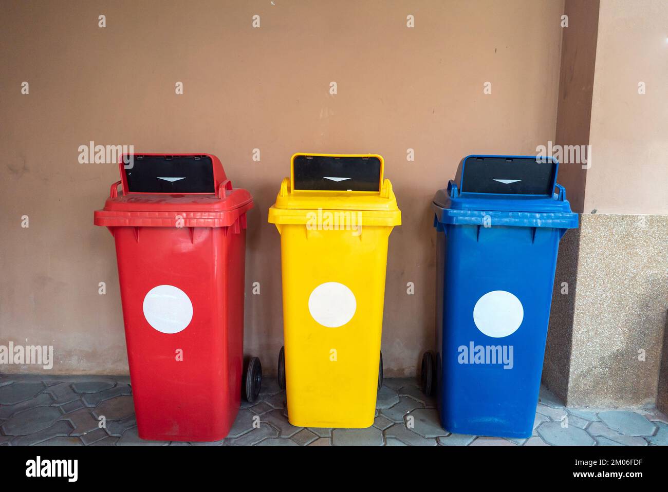 Color-segregated bins for proper waste separation Stock Photo - Alamy