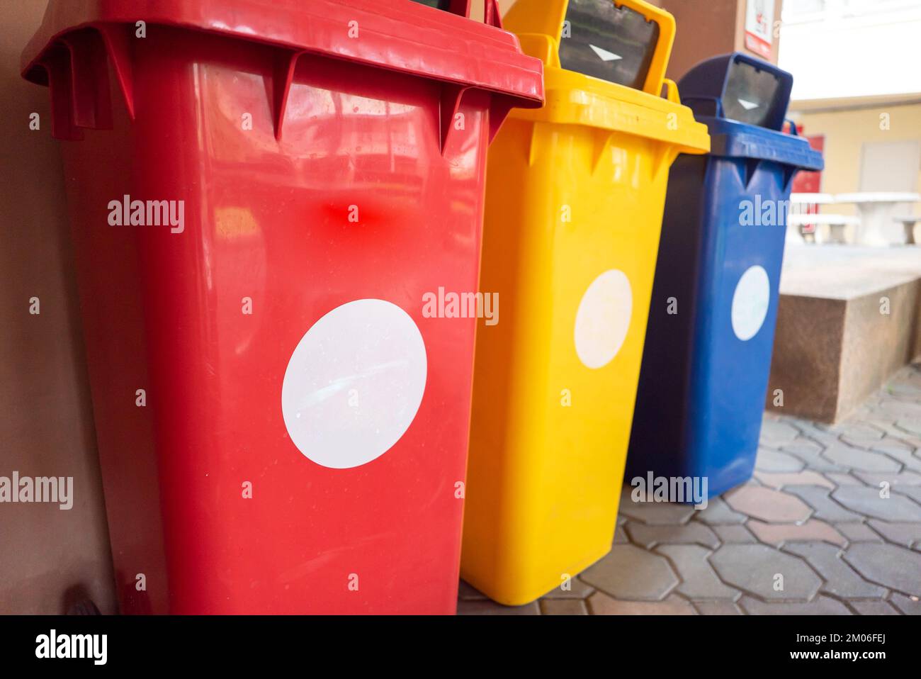 Color-segregated bins for proper waste separation Stock Photo - Alamy