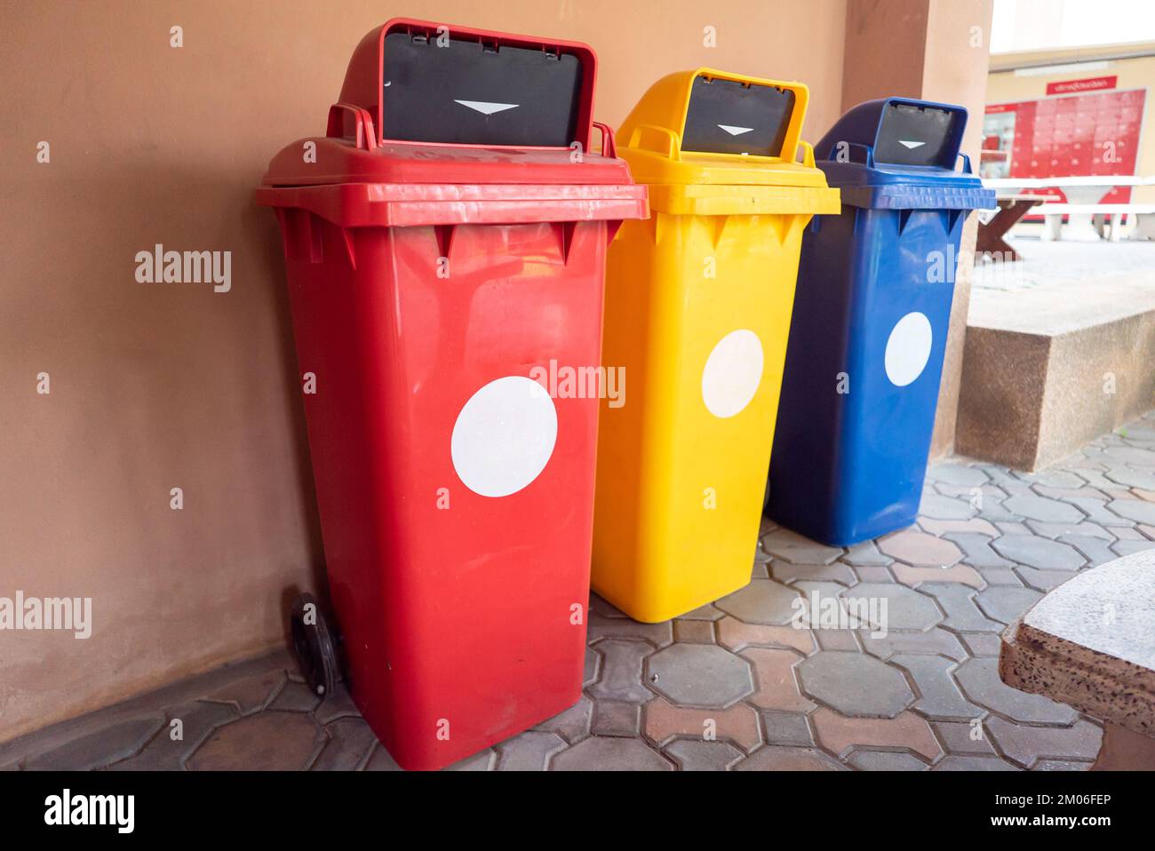 Color-segregated bins for proper waste separation Stock Photo - Alamy