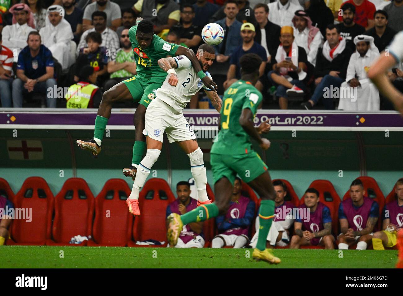 Kyle Walker of England and Ismaila Sarr of Senegal during England v ...