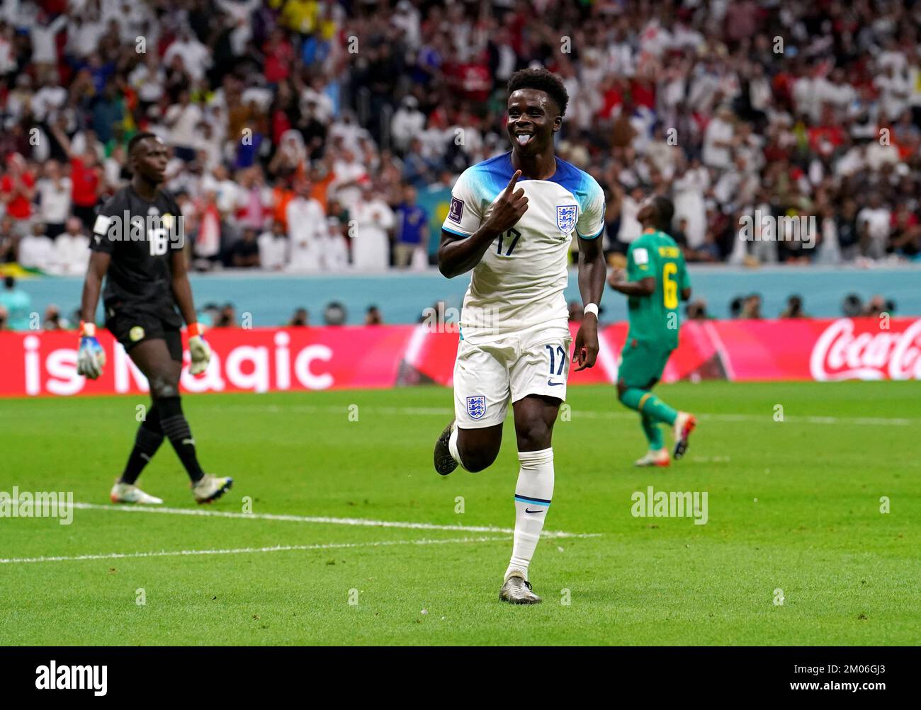 England's Bukayo Saka celebrates scoring their side's third goal of the ...