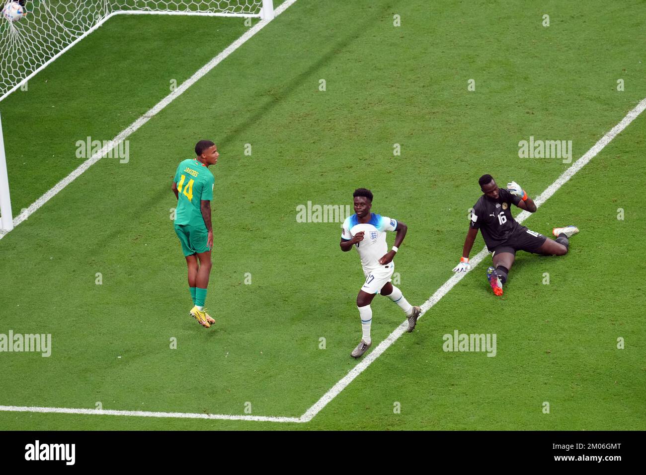 England's Bukayo Saka celebrates after scoring the third goal during ...