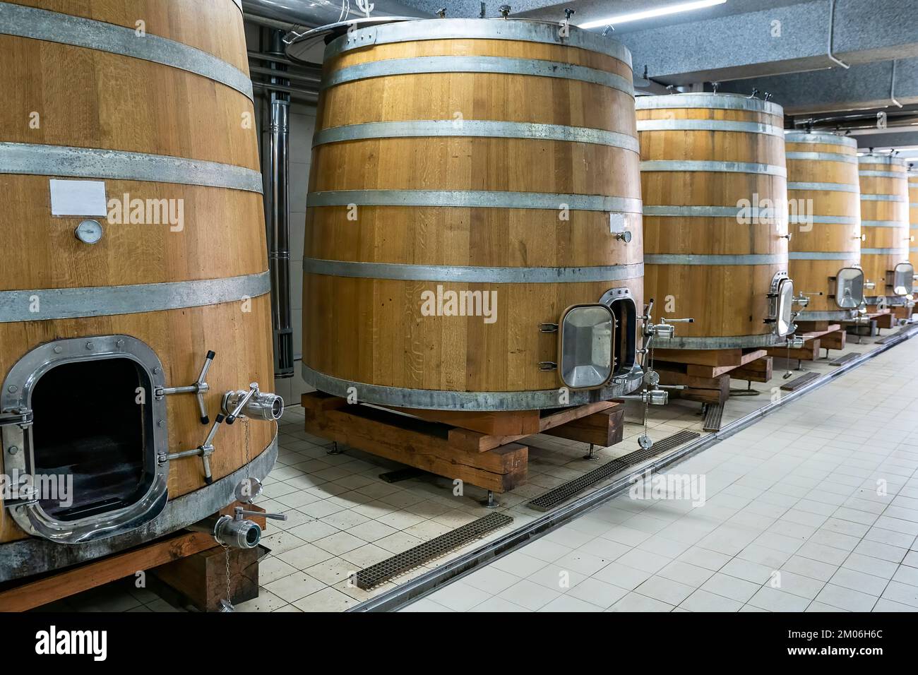 Large modern wine barrels at the winery, the concept of a large factory ...