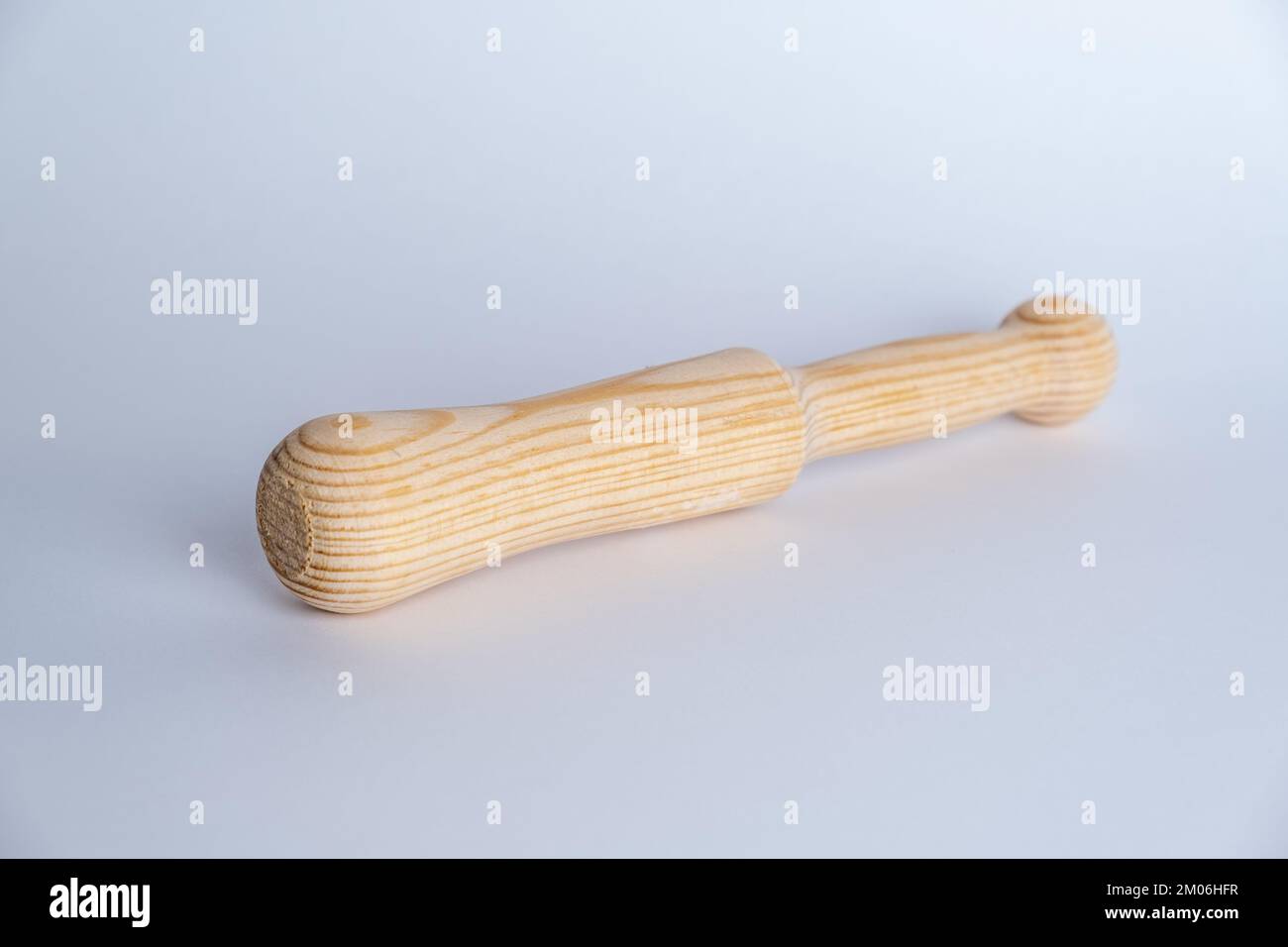 Wooden pestle isolated on white background Stock Photo - Alamy
