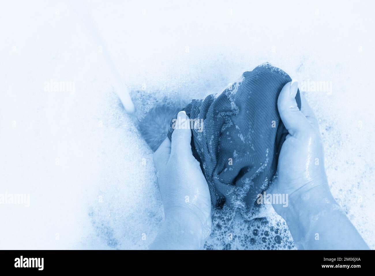 Woman hand washing white clothing suds hi-res stock photography and ...