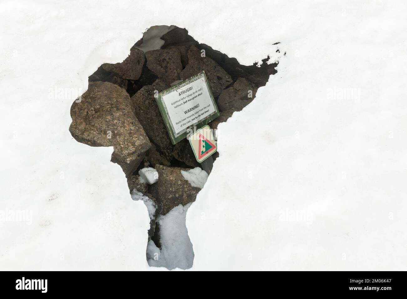 Hole in the snow, hidden warning sign, danger to enter caves at ...