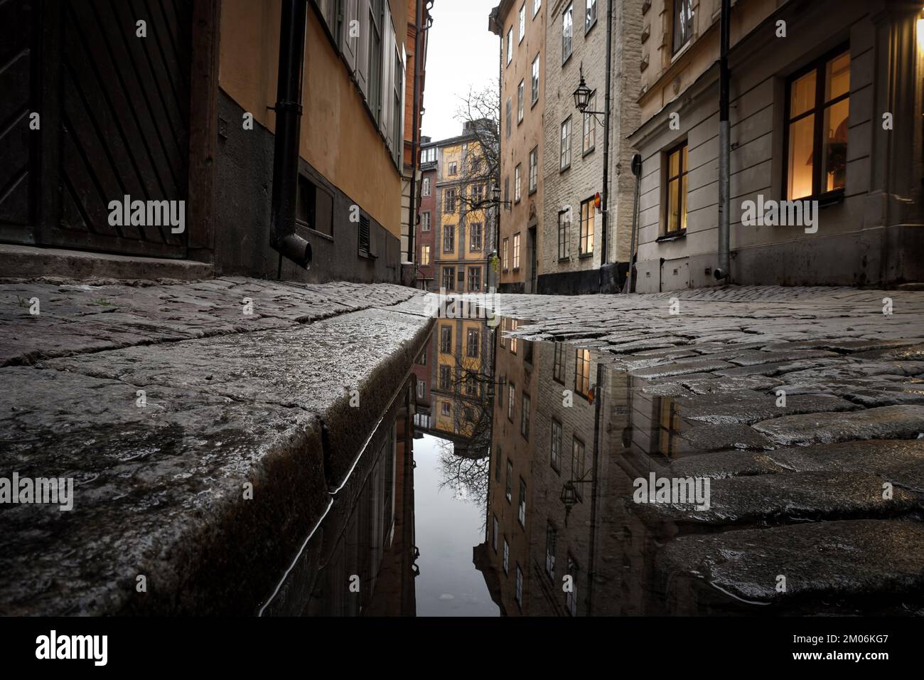 Reflection puddle brick sidewalk hi-res stock photography and images ...