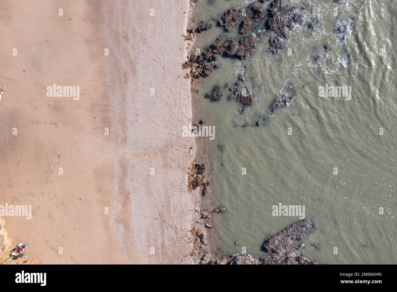 Water texture, rocks, sandy beach, ocean landscape Stock Photo - Alamy