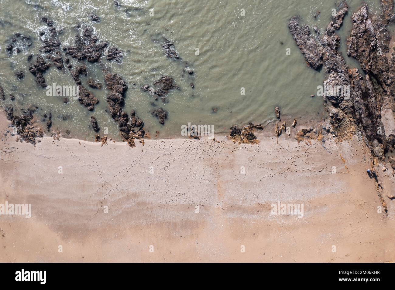 Water texture, rocks, sandy beach, ocean landscape Stock Photo - Alamy