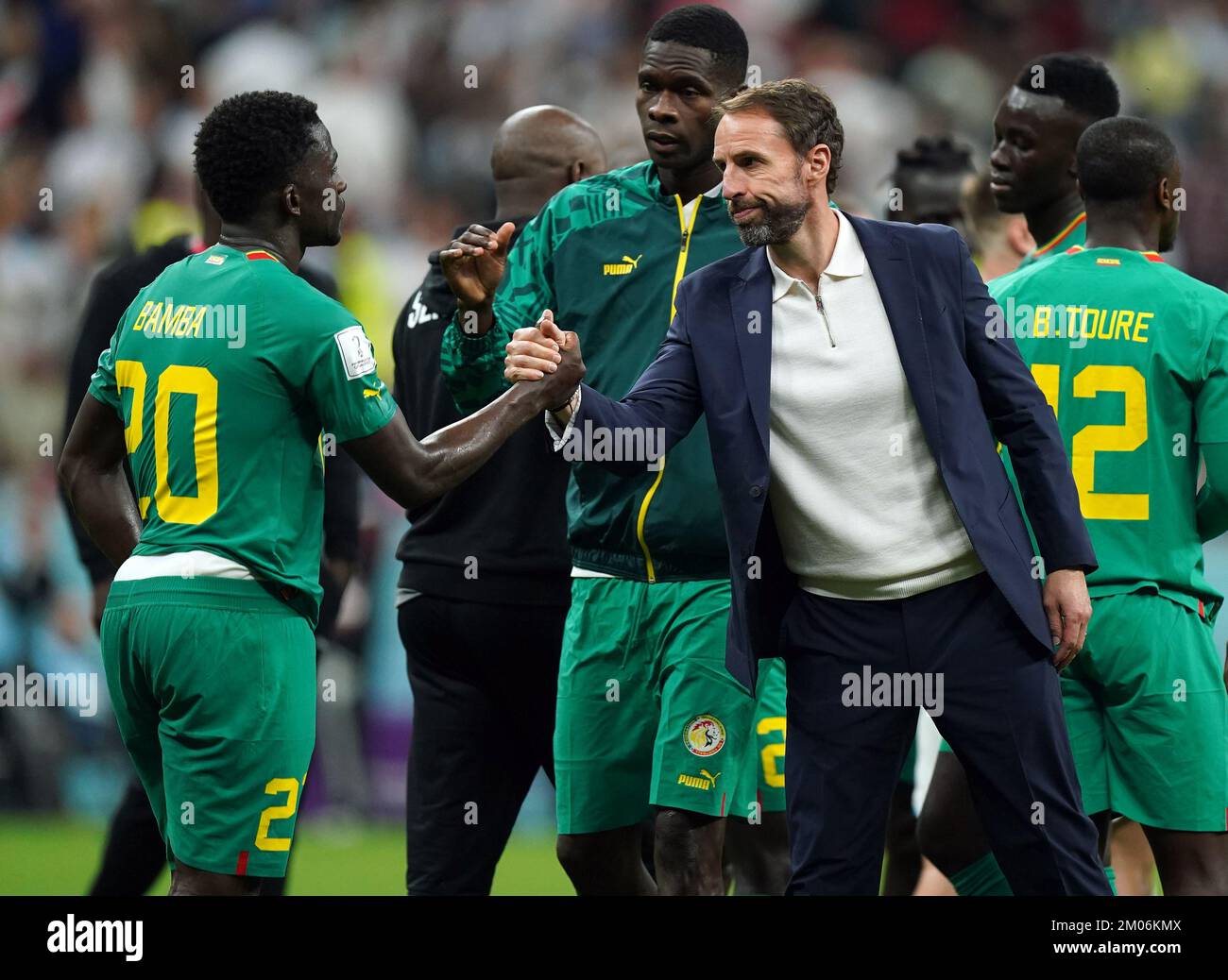 England manager Gareth Southgate with Senegal's Bamba Dieng following ...