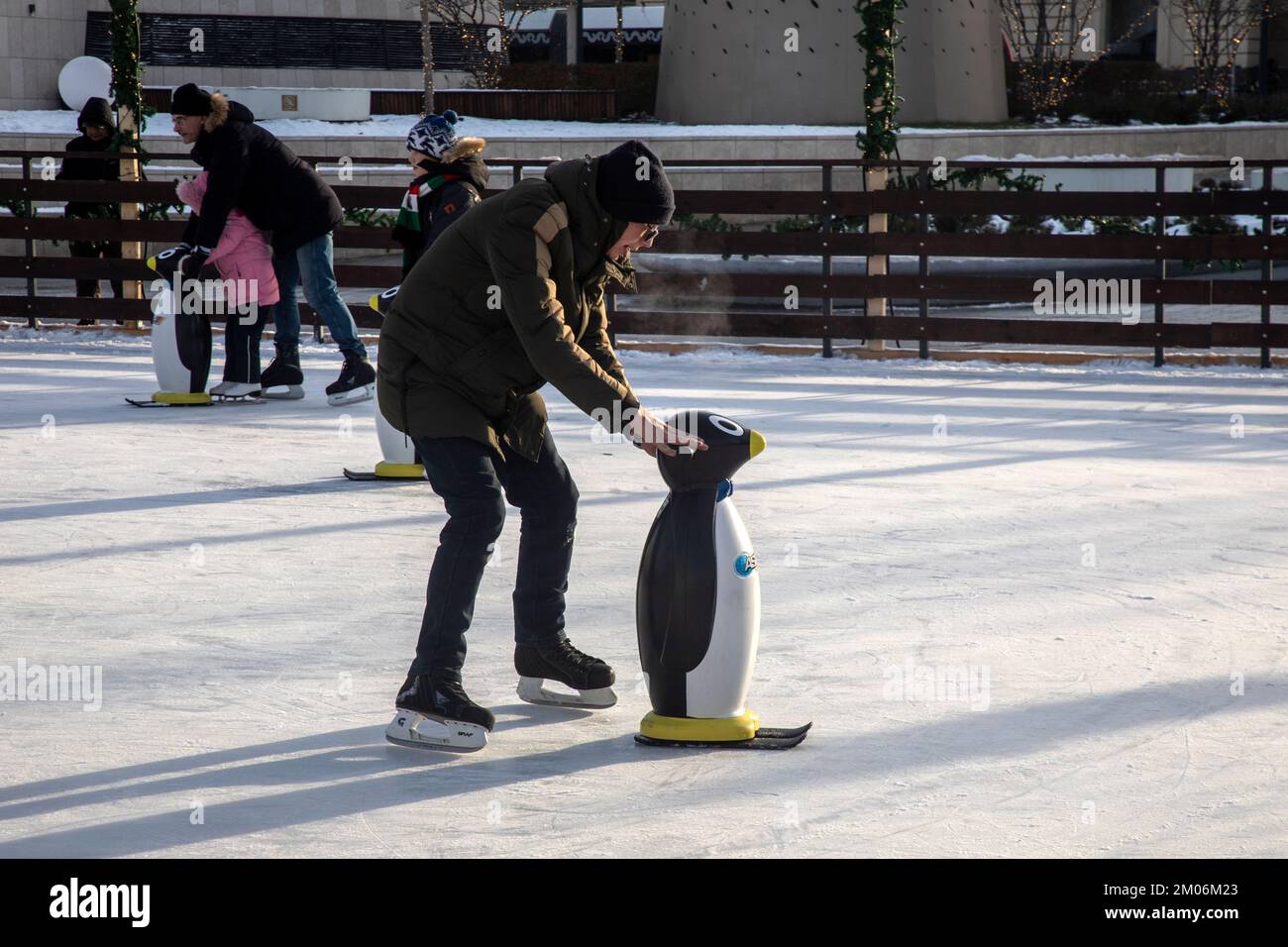 Moscow, Russia. 4th December, 2022. People skate at a city skating rink ...