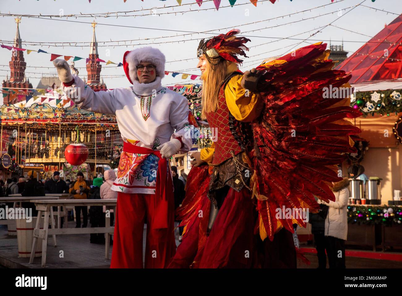 Moscow, Russia. 4th December, 2022. Stilt walkers at GUM Fair in Red ...