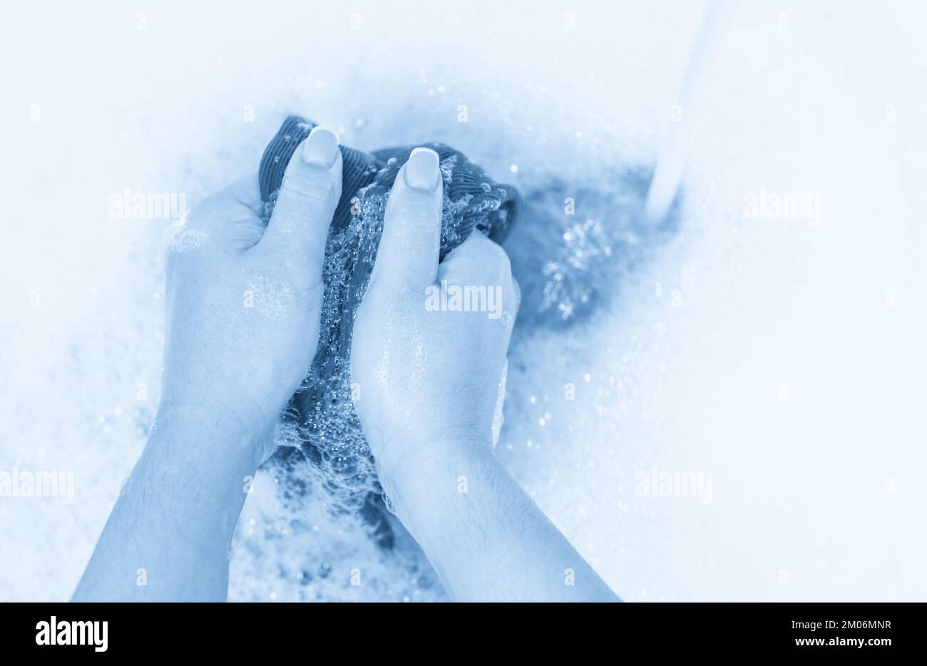 Hand washing clothes sink hi-res stock photography and images - Alamy