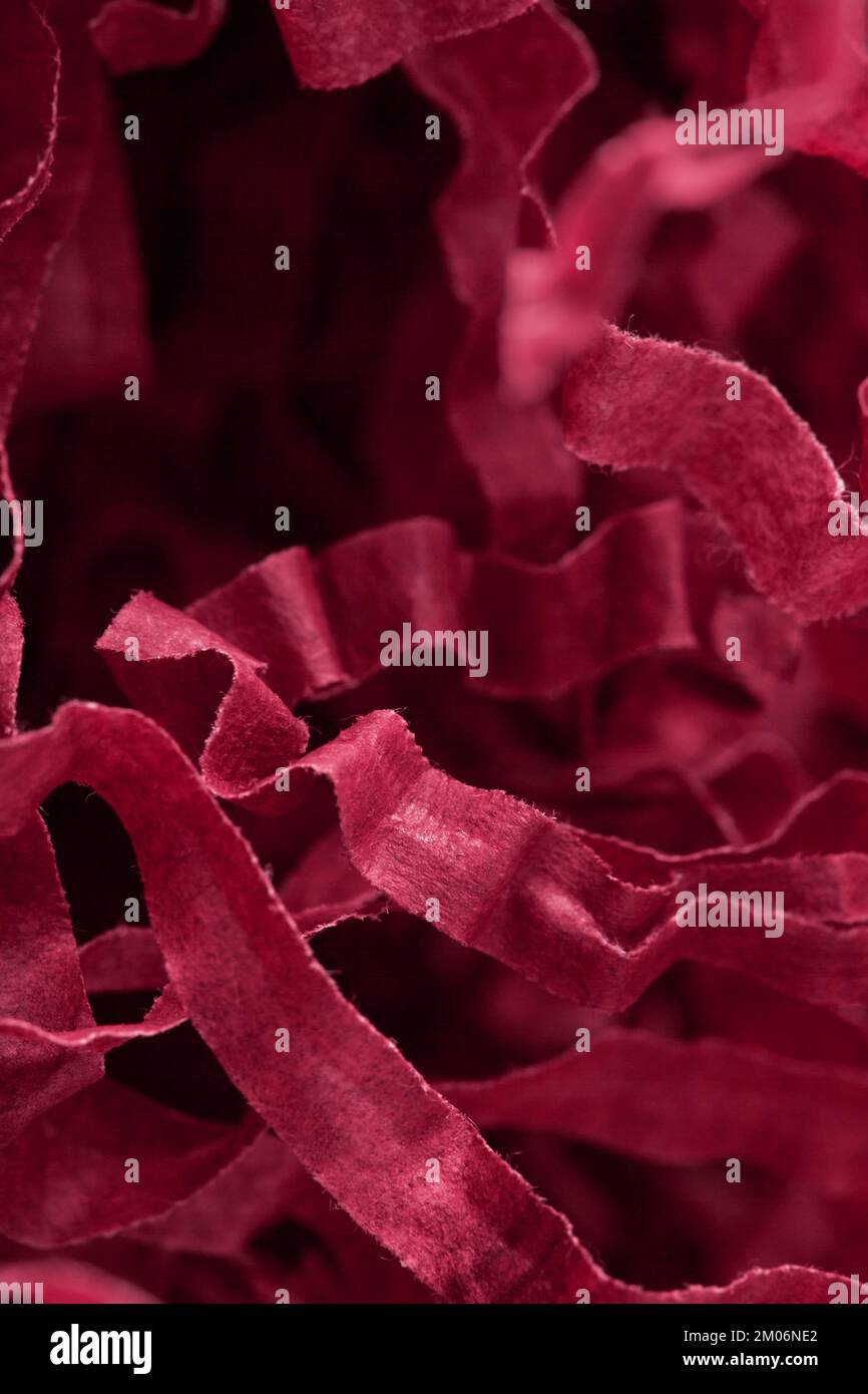 Red twisted tissue paper tapes. Futuristic abstract background in viva ...