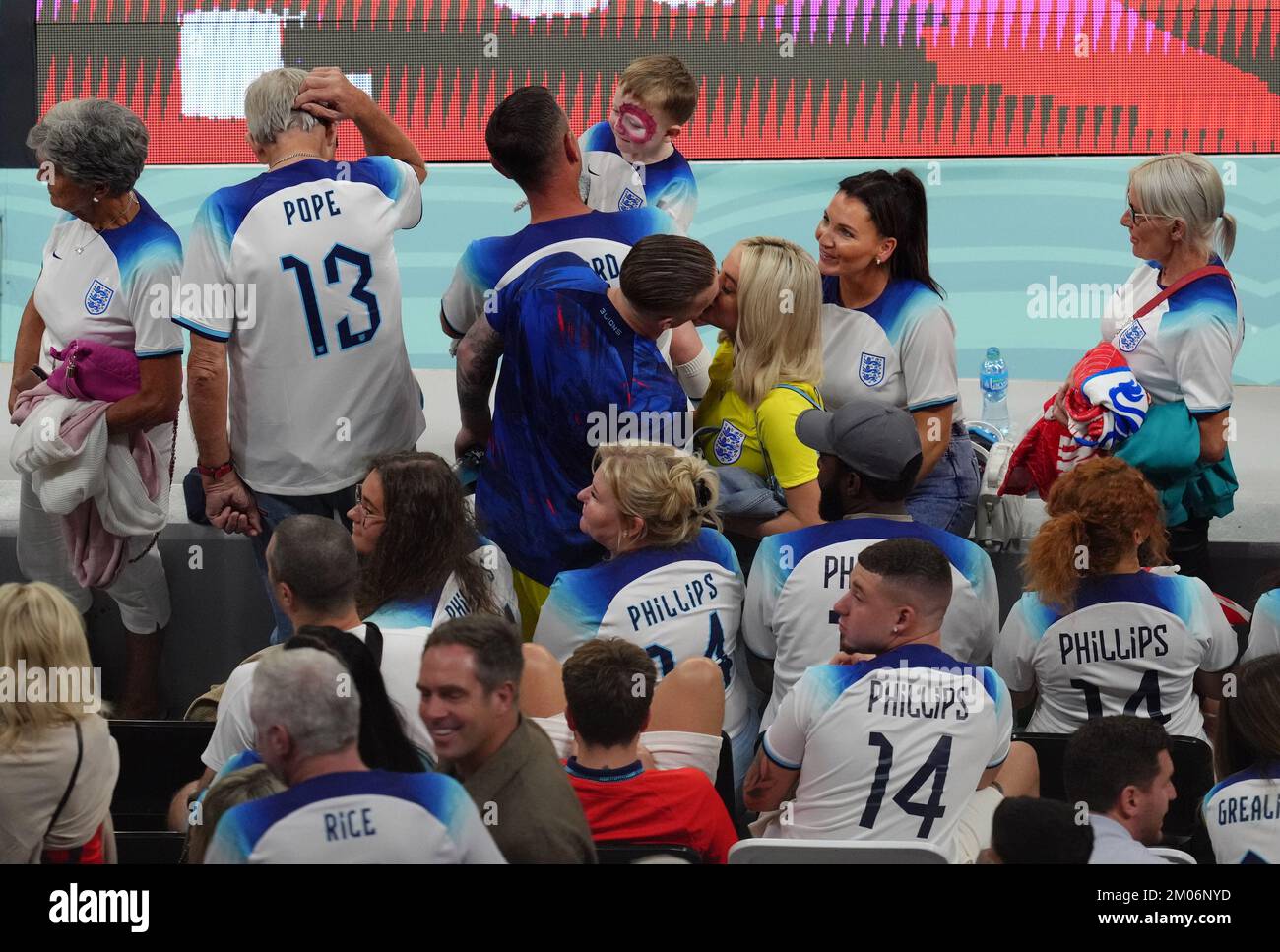 England goalkeeper Jordan Pickford greets his wife Megan following the ...