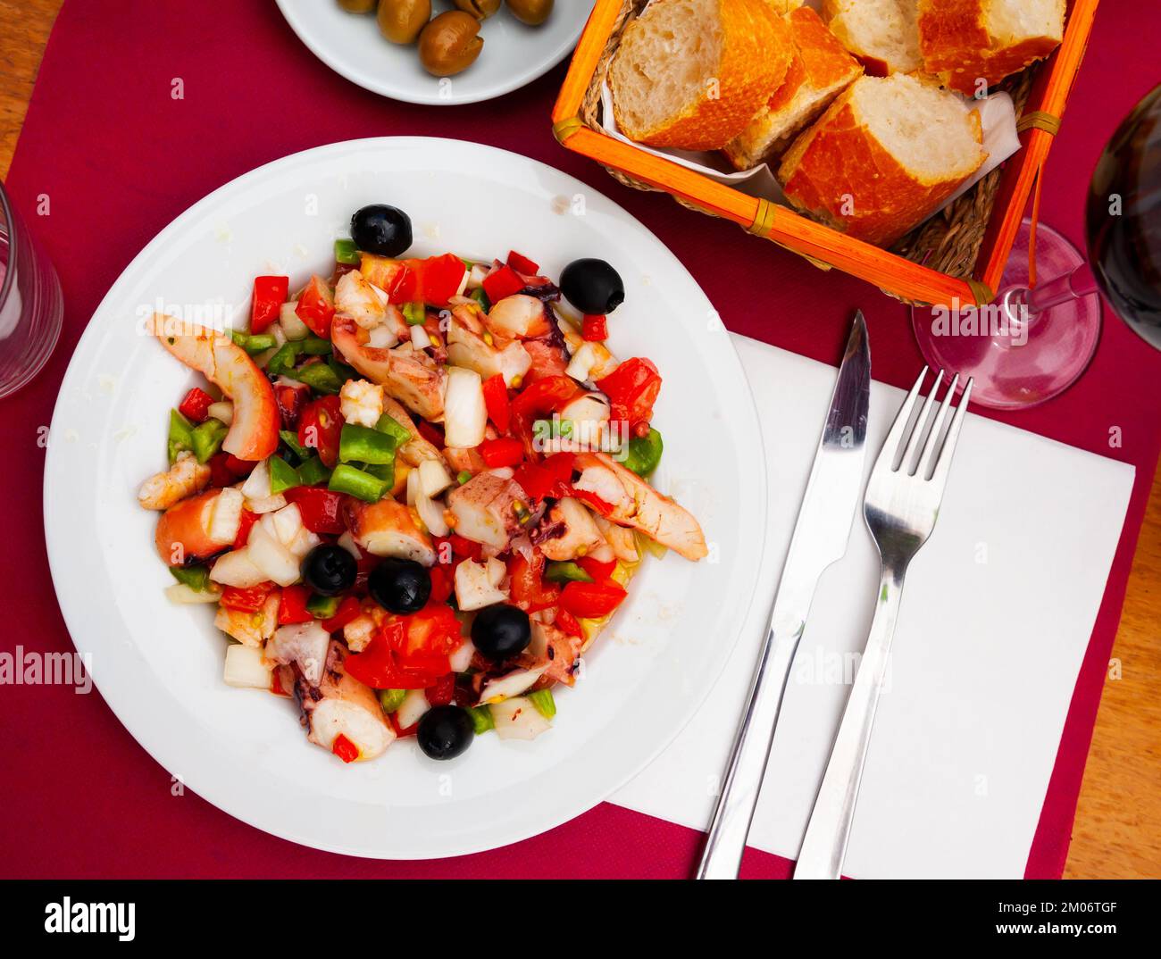 Delicious salad from variety of seafood with chopped vegetables ...