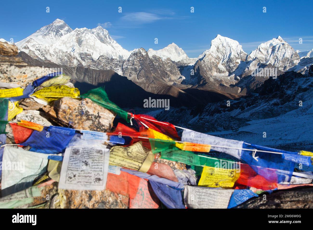view of Mount Everest, Lhotse and Makalu with buddhist prayer flags, Mount Everest seen from ...