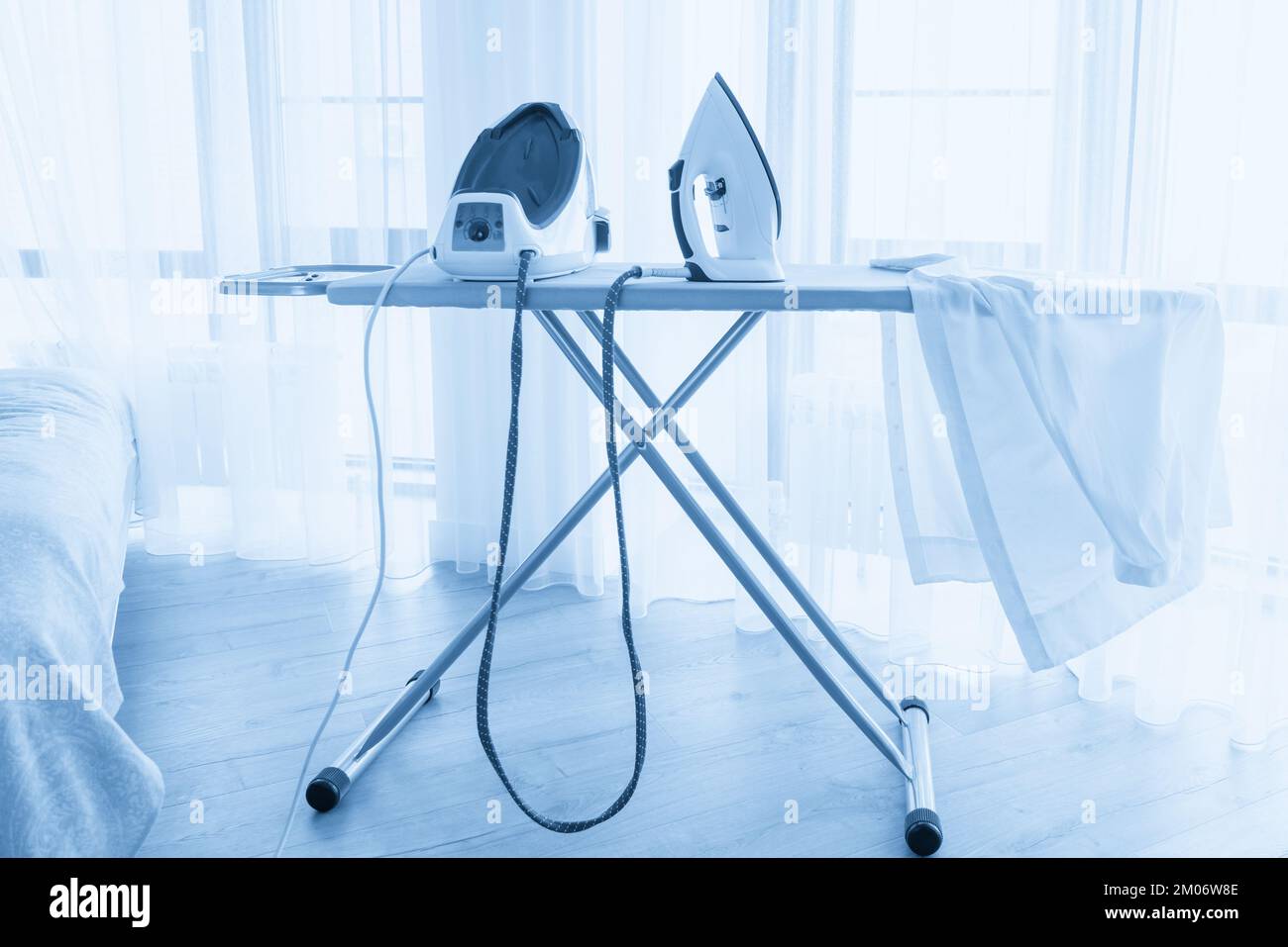 Steam generator iron standing hi-res stock photography and images - Alamy