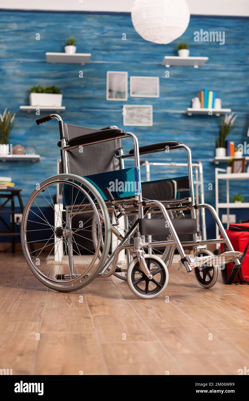 Wheelchair in nursing home room to aid mobility and recovery. Object ...