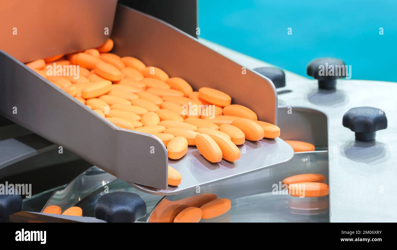 Pharmaceutical medicine orange tablet pill background at pharmacy ...