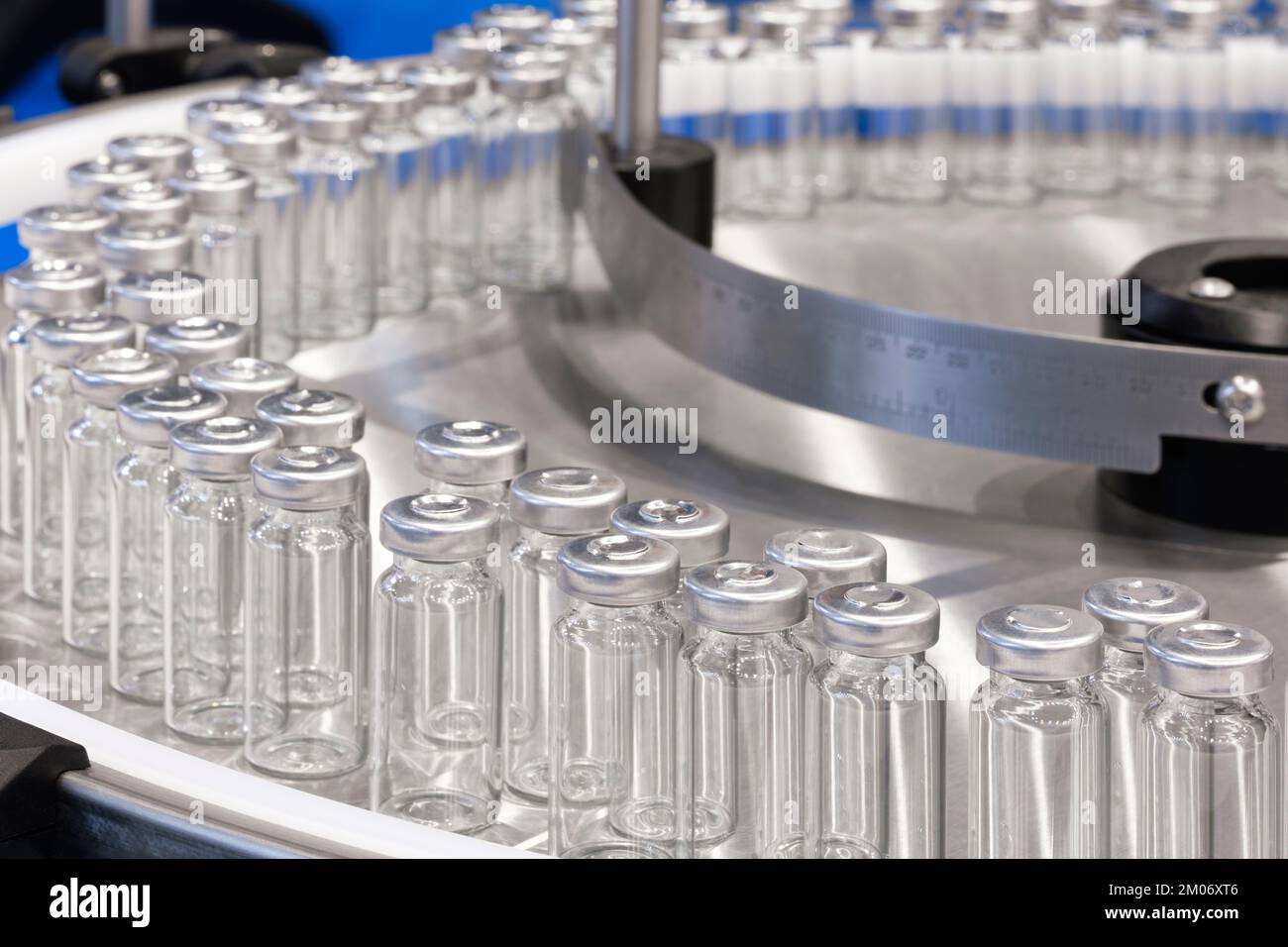 Pharmaceutical industry. Production line machine conveyor with glass ...