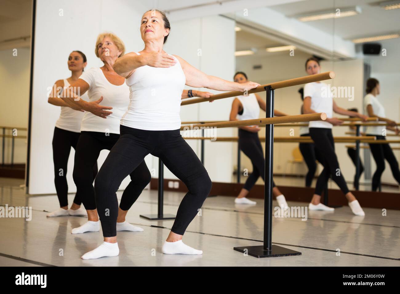 Group of women doing ballet dance moves Stock Photo - Alamy