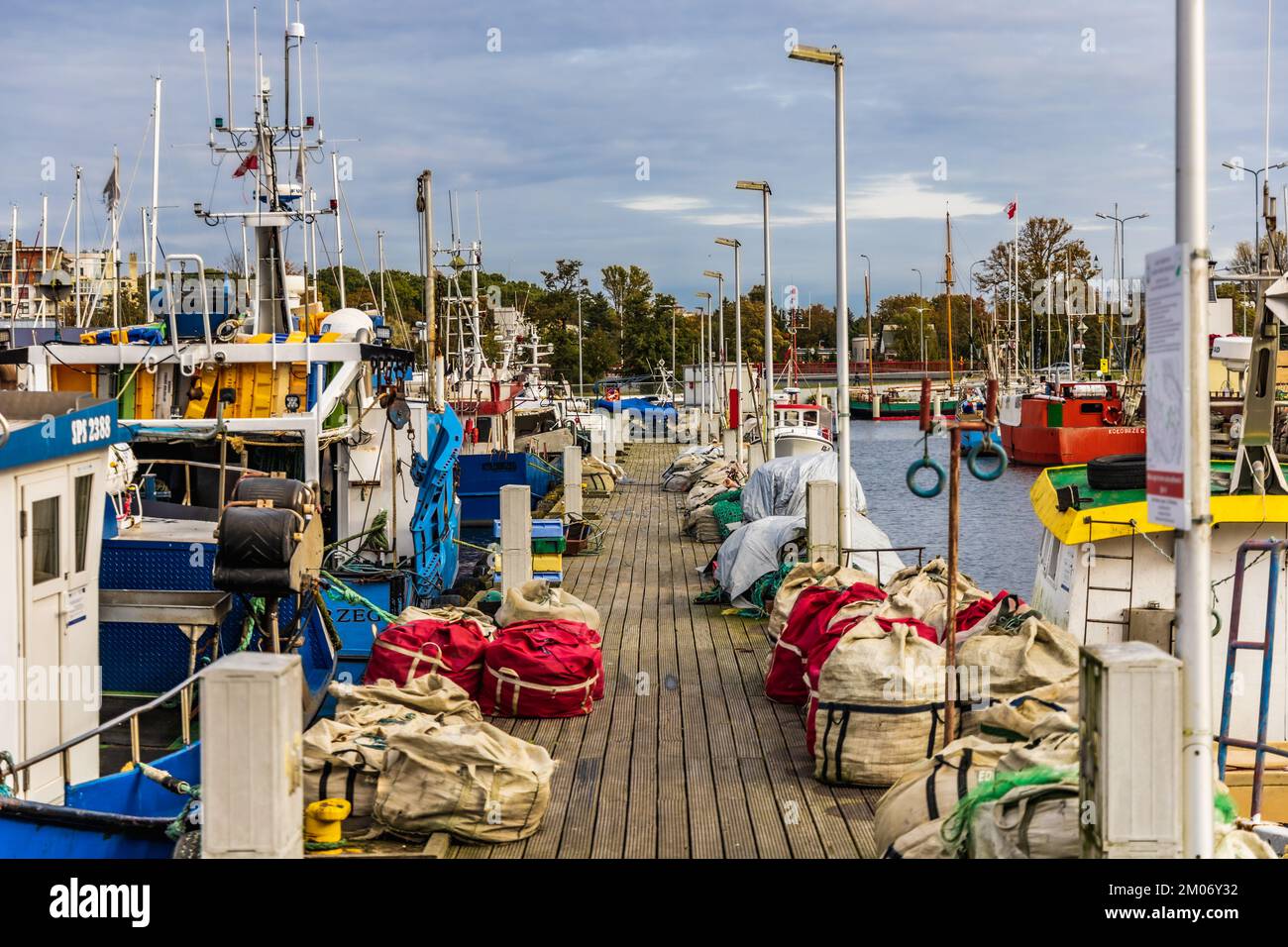 Kolobrzeg, Poland - October 2021: Long wooden platform with bags and ...
