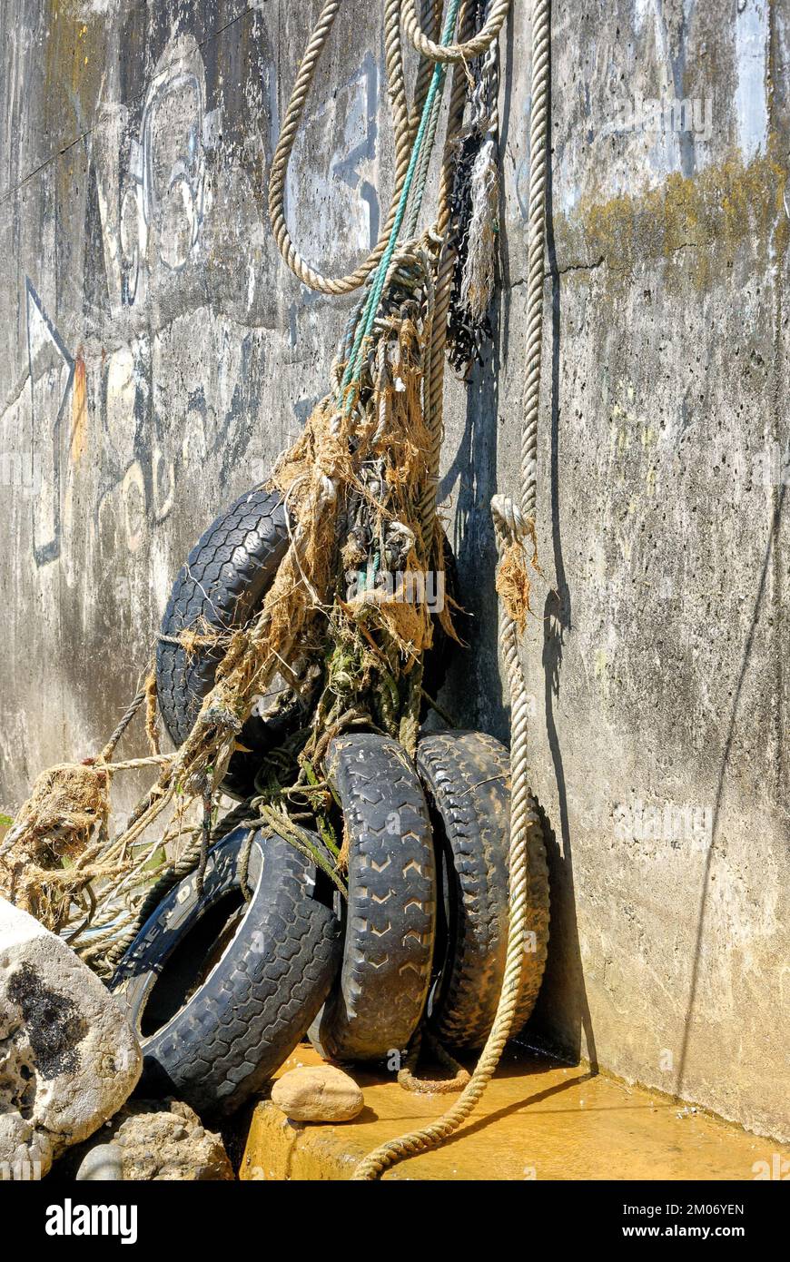 Old vintage tyre made fender buoy for mooring boat - boat buoy ...