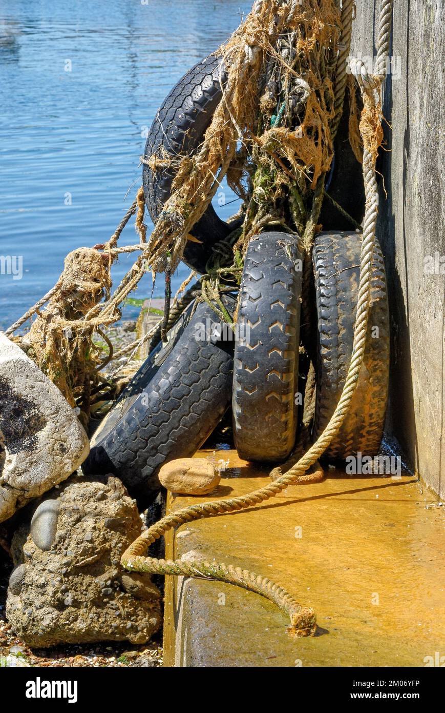 Old vintage tyre made fender buoy for mooring boat - boat buoy ...