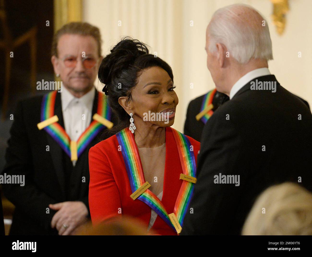 President Joe Biden greets Gladys Knight at a reception for Kennedy ...