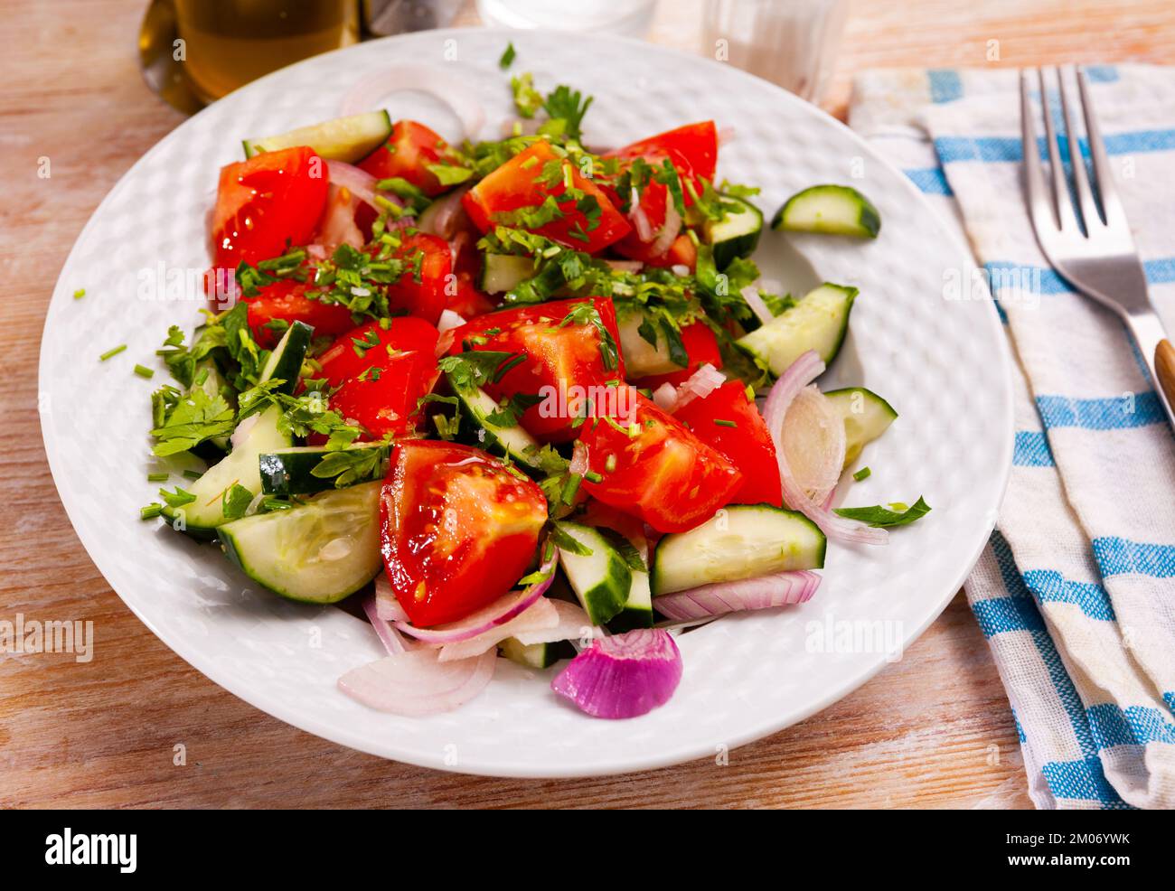 Vegetable salad of fresh tomatoes, cucumber, red onion, greens Stock ...