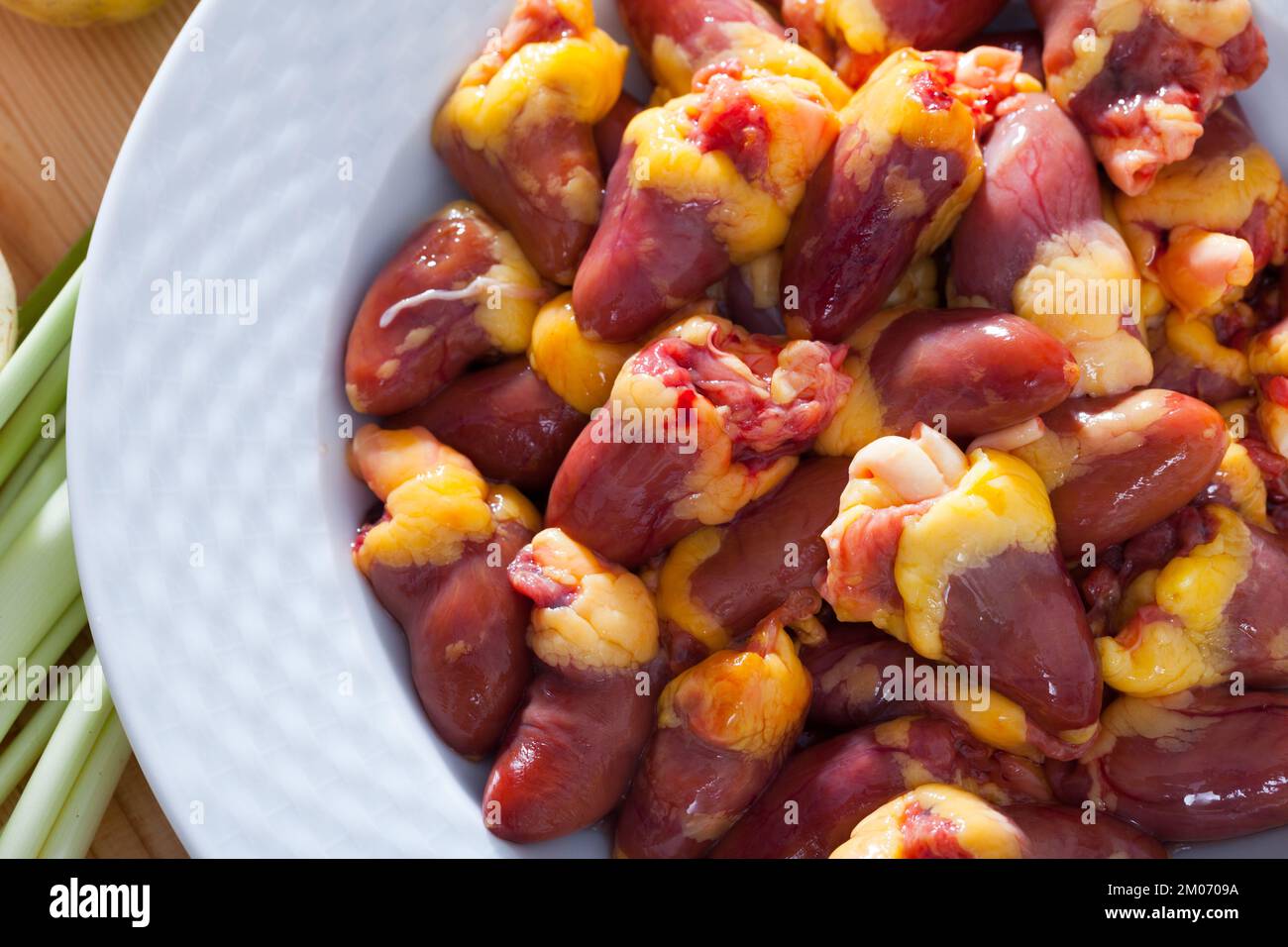 Closeup of fresh raw chicken hearts Stock Photo - Alamy