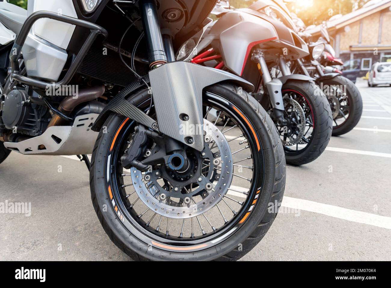 Close-up detail view modern motorcycle front wheel carbon fiber fender ...