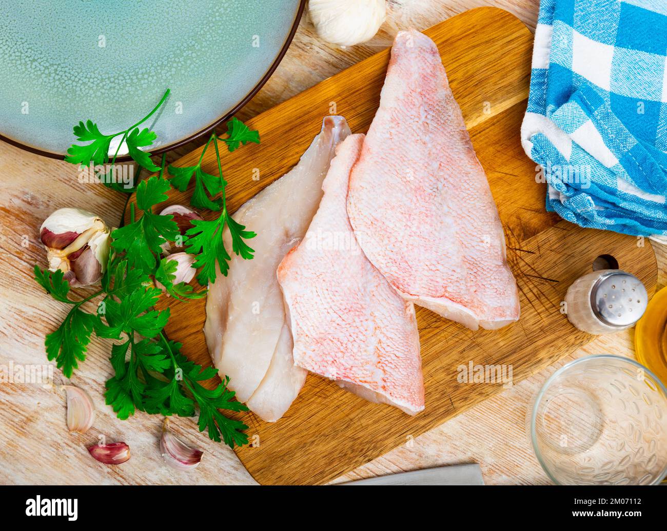 Fresh raw fillet of sea bass Stock Photo - Alamy