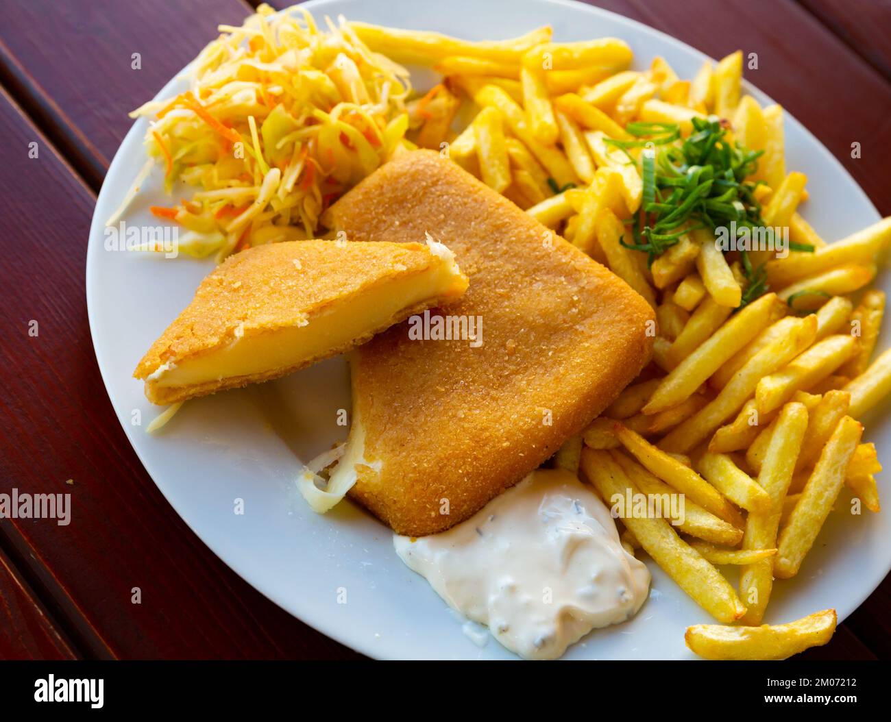 Fried cheese with fries, tartare Stock Photo - Alamy
