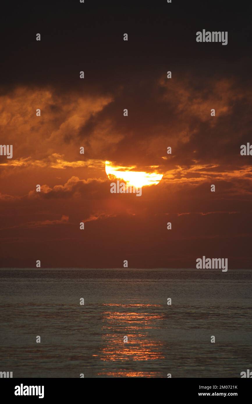 Amber sunset over water hi-res stock photography and images - Alamy