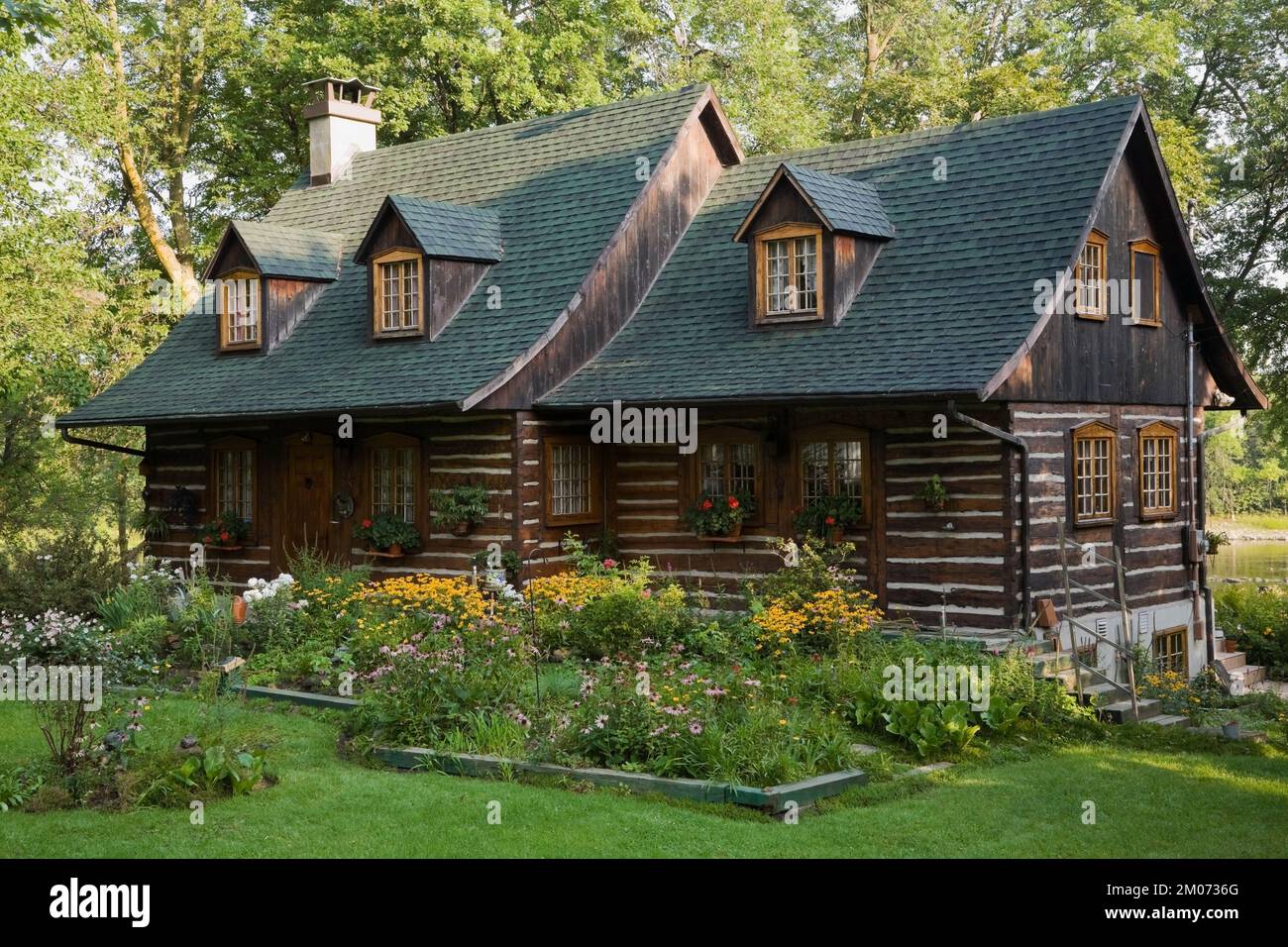 Old 1800s reconstructed Canadiana cottage style log home with ...