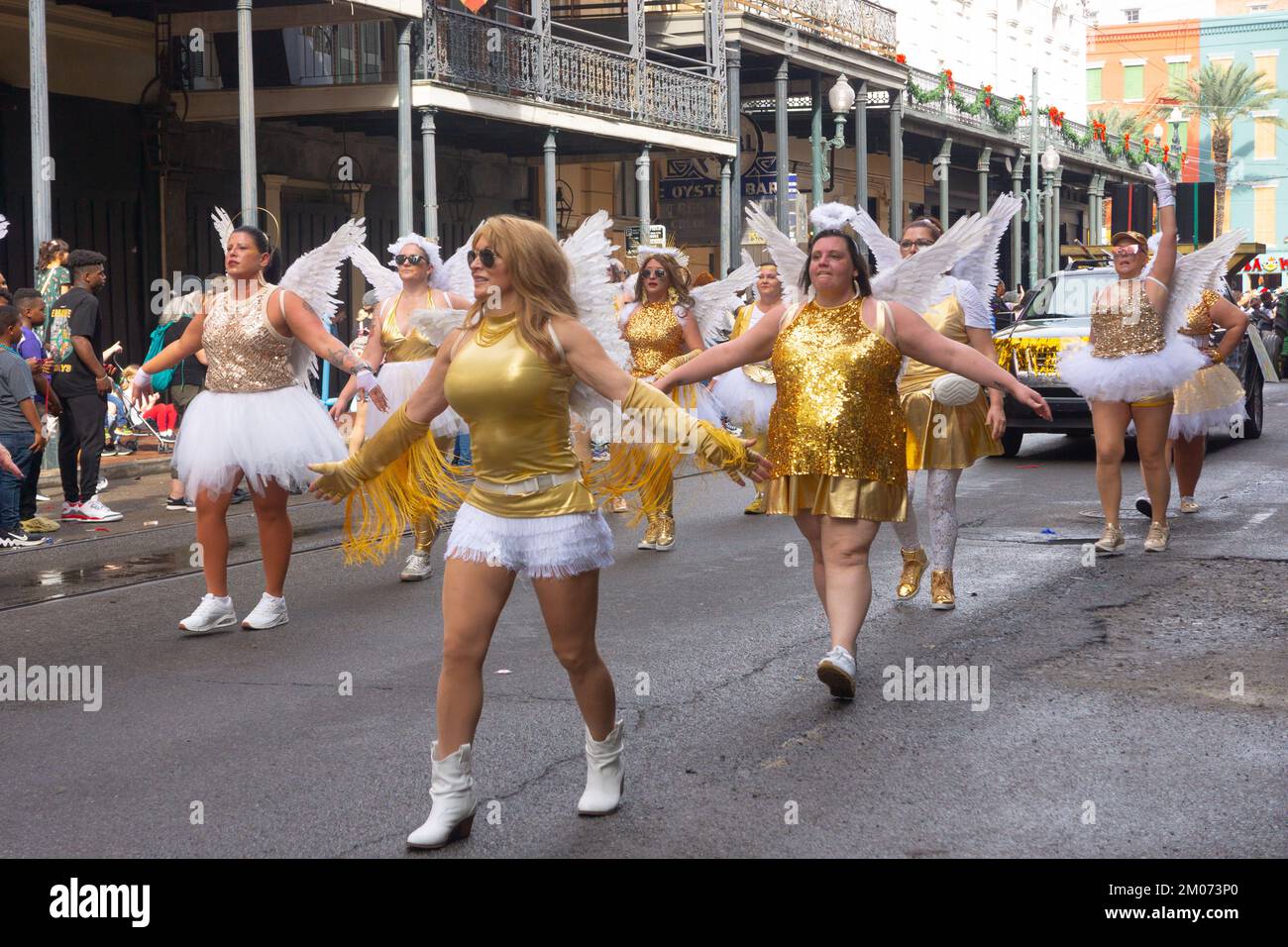 Female angels marching group in New Orleans' Christmas parade for ...