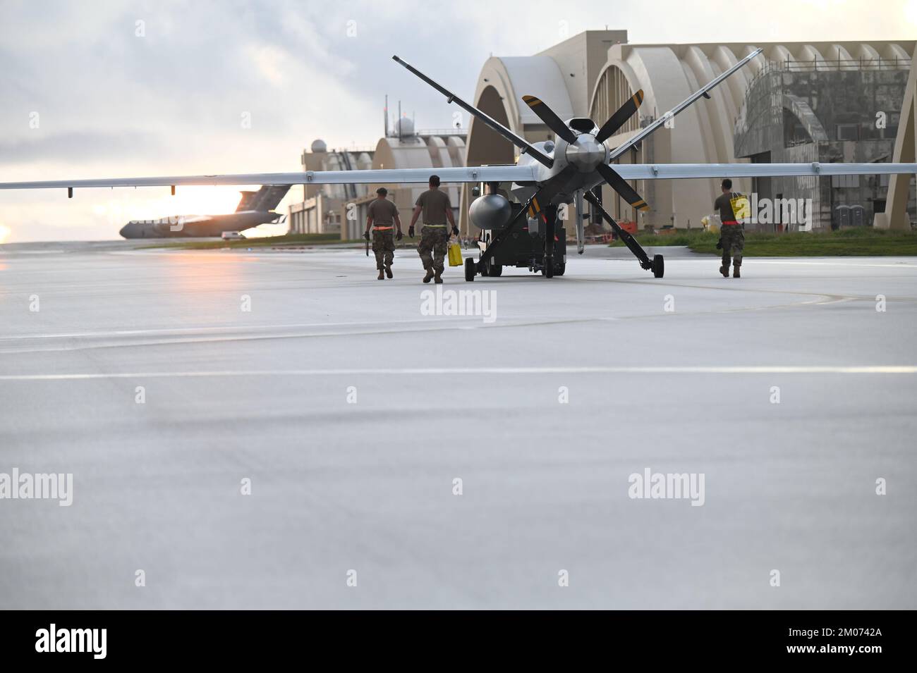 U.S. Air Force Maintainers of the 119th Wing assist with tow of MQ-9 ...