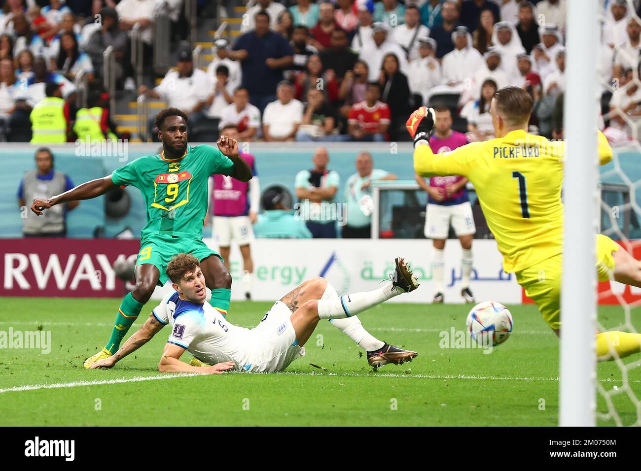 Al Khor, Qatar. 04th Dec, 2022. Jordan Pickford of England blocks the ...