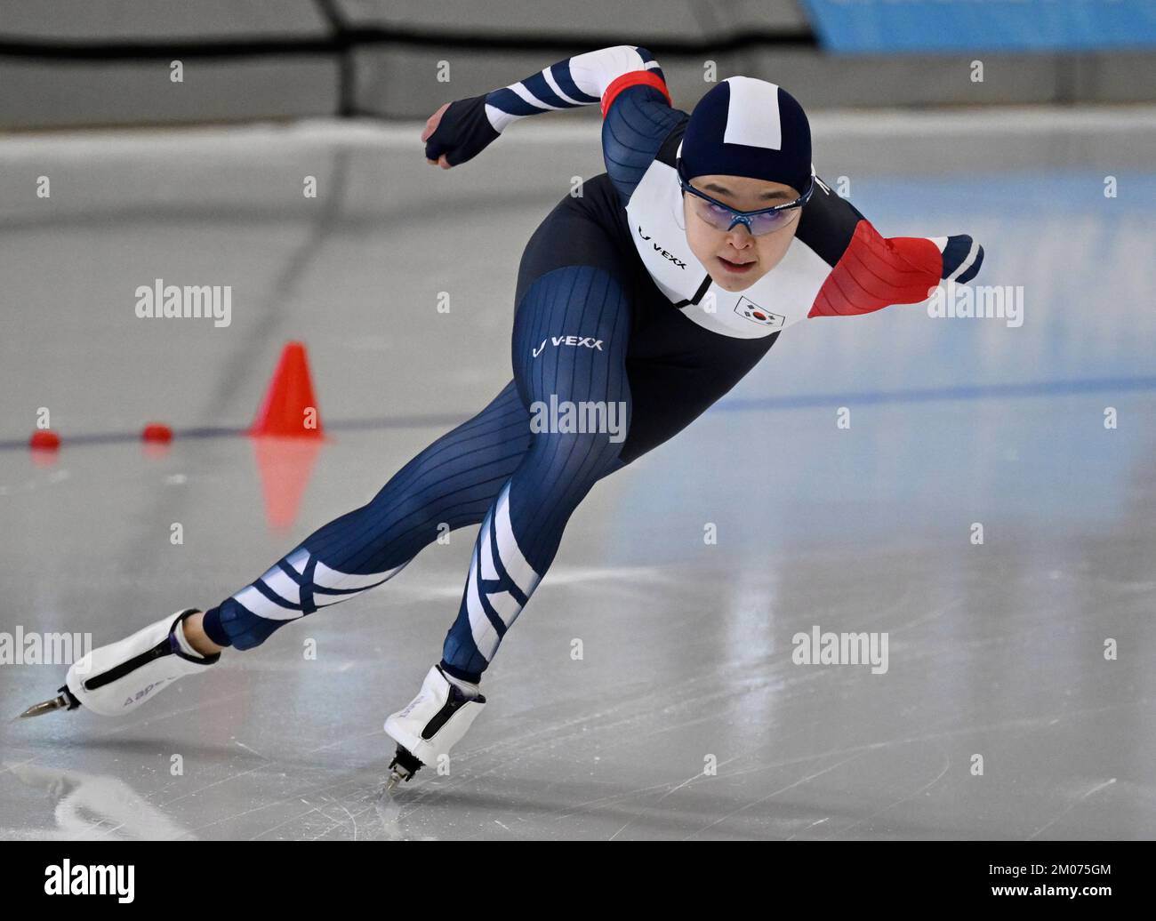 Min-Sun Kim of Korea skates to a gold medal in the women's 1000m event ...
