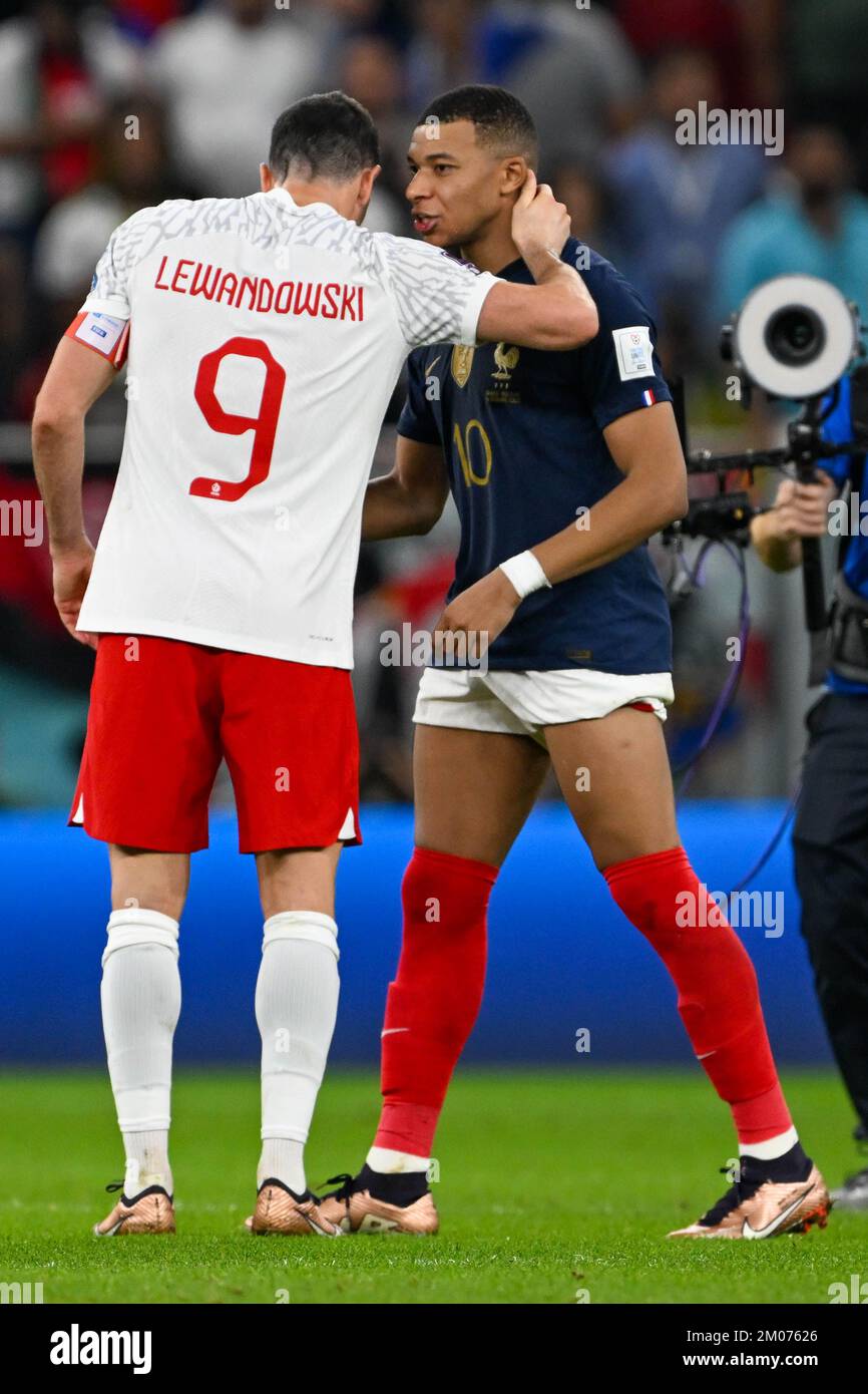 Robert Lewandowski of Poland and Kylian MBAPPE of France during the ...