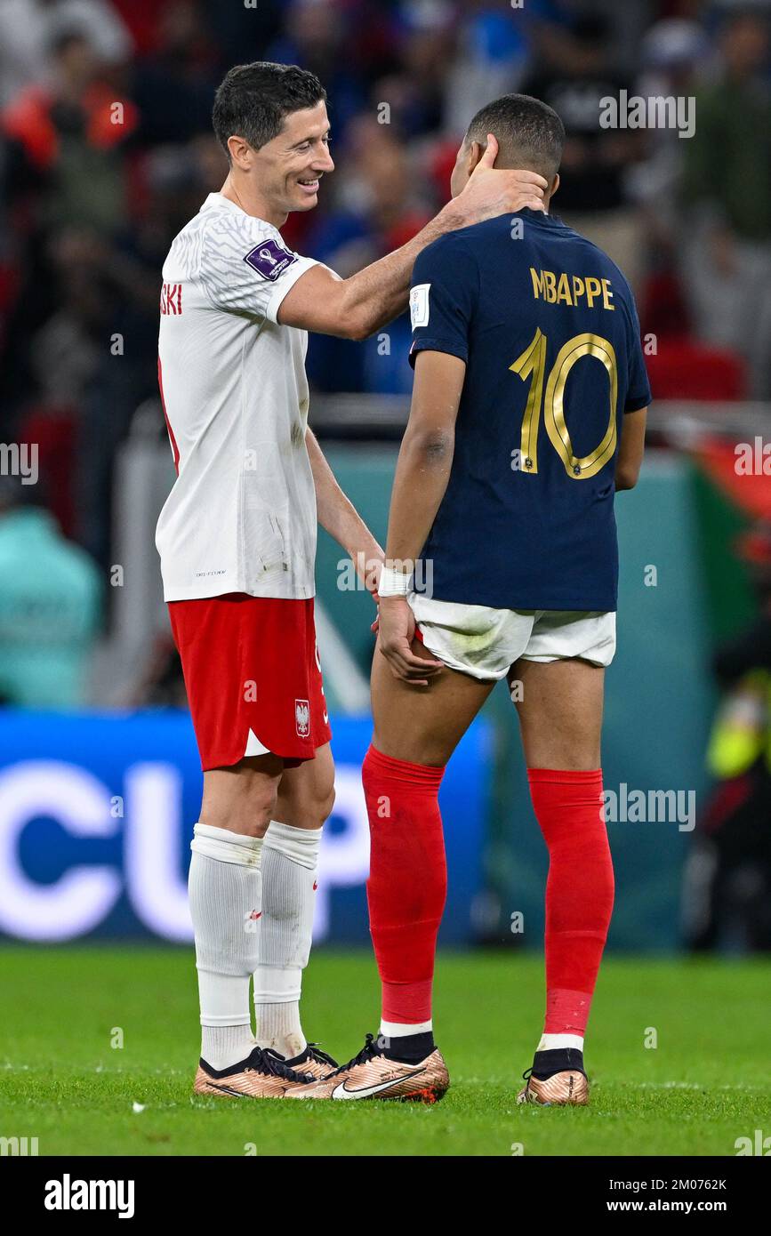 Robert Lewandowski of Poland and Kylian MBAPPE of France during the ...