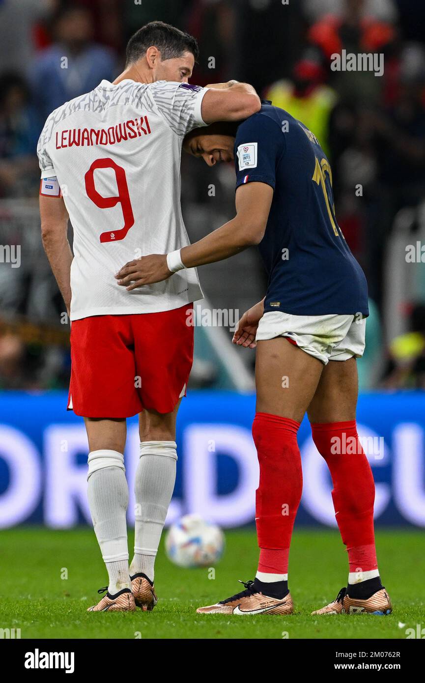 Robert Lewandowski of Poland and Kylian MBAPPE of France during the ...